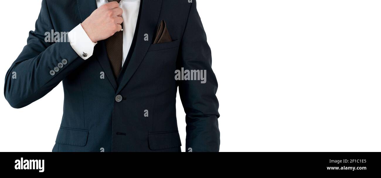 Smiling man adjusting necktie hi-res stock photography and images - Alamy