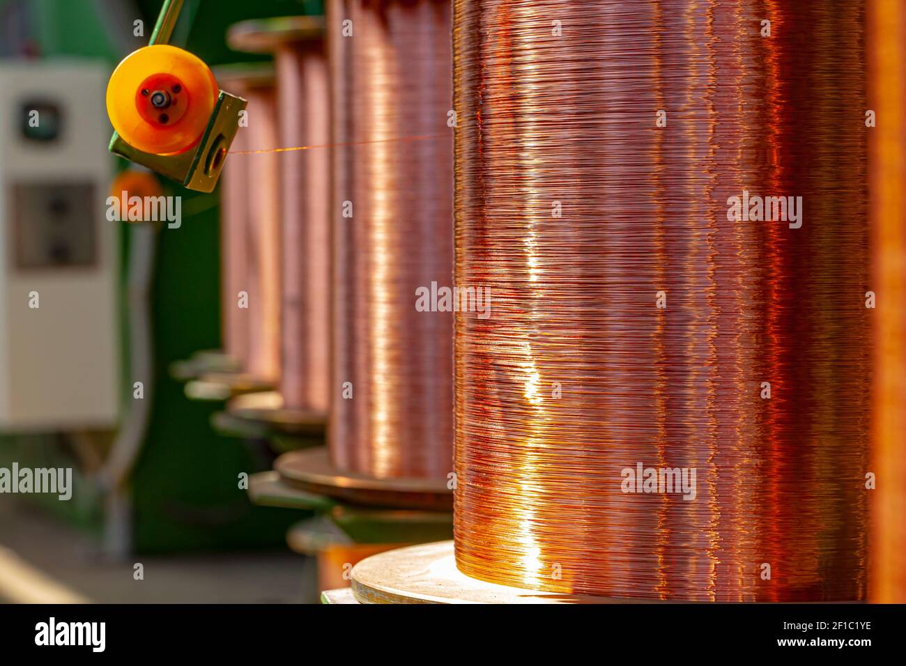 Copper wire reels in cable factory close up Stock Photo - Alamy
