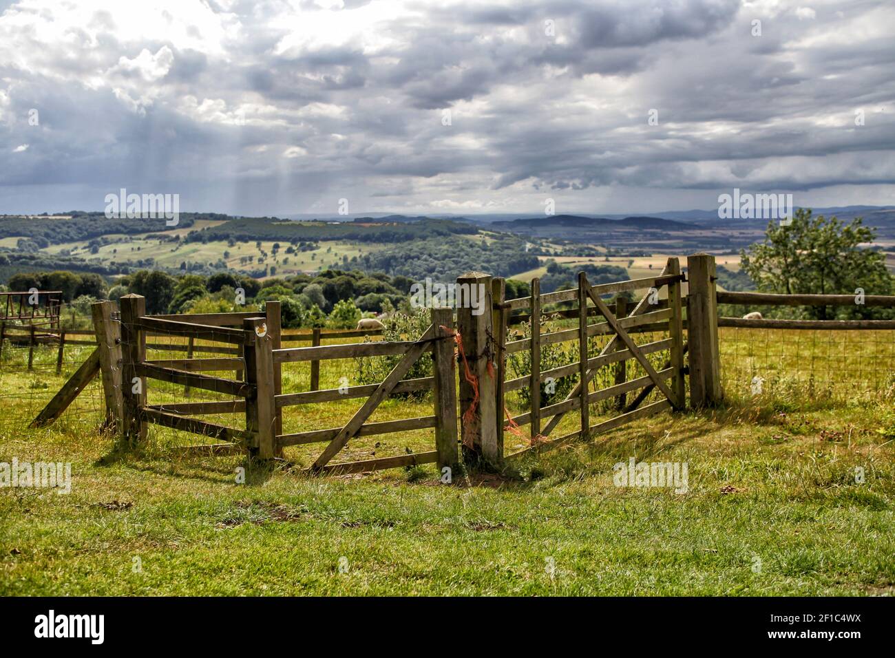 Beautiful English landscape with wooden fence Stock Photo - Alamy