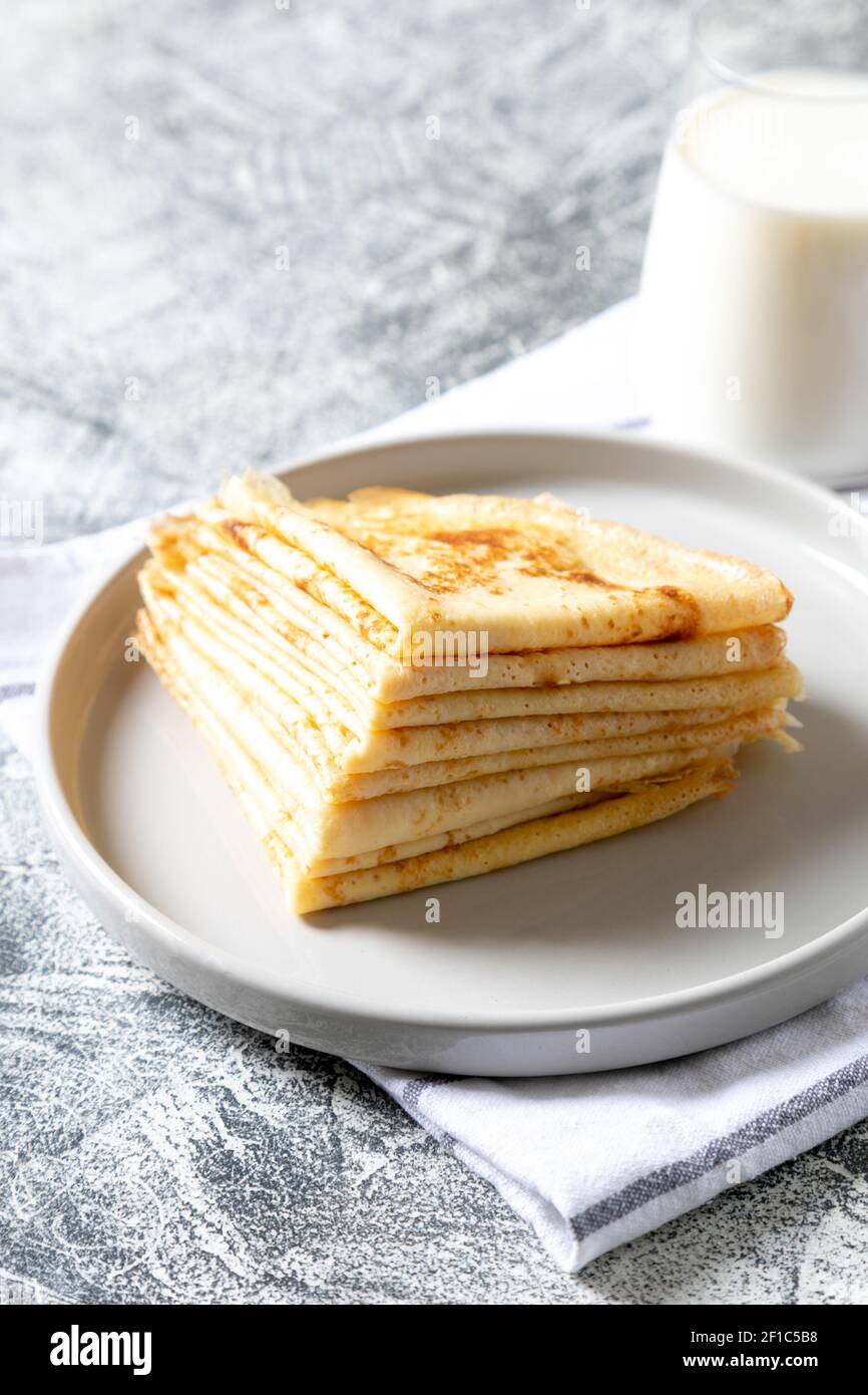 Crepes, thin pancakes on a plate. comfor food, delicious homemade ...