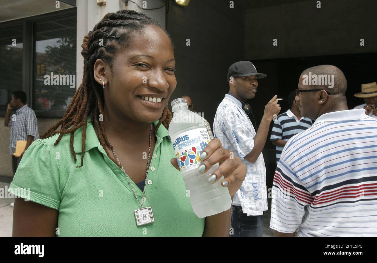 Nina Ball, who stopped smoking 10 months ago, stands in front of the charter school where she ...
