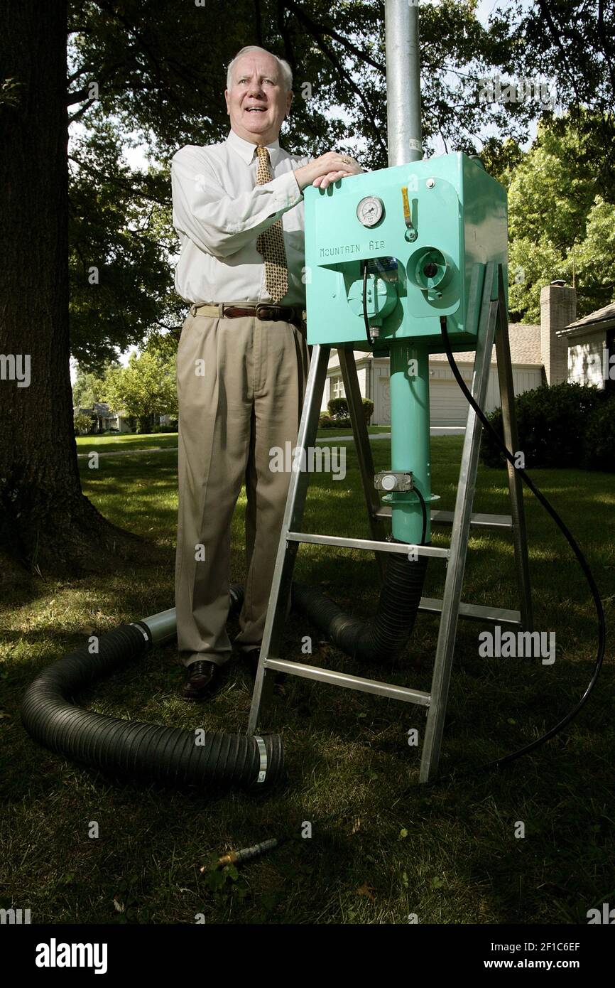 Don Sifers of Mission, Kansas, shows off his invention that will remove ...
