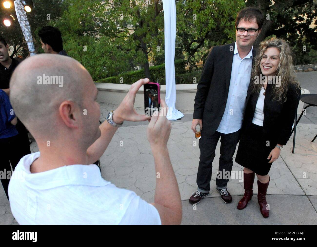 Dan McLaughlin, left, of San Ramon, California, takes a photo of his ...