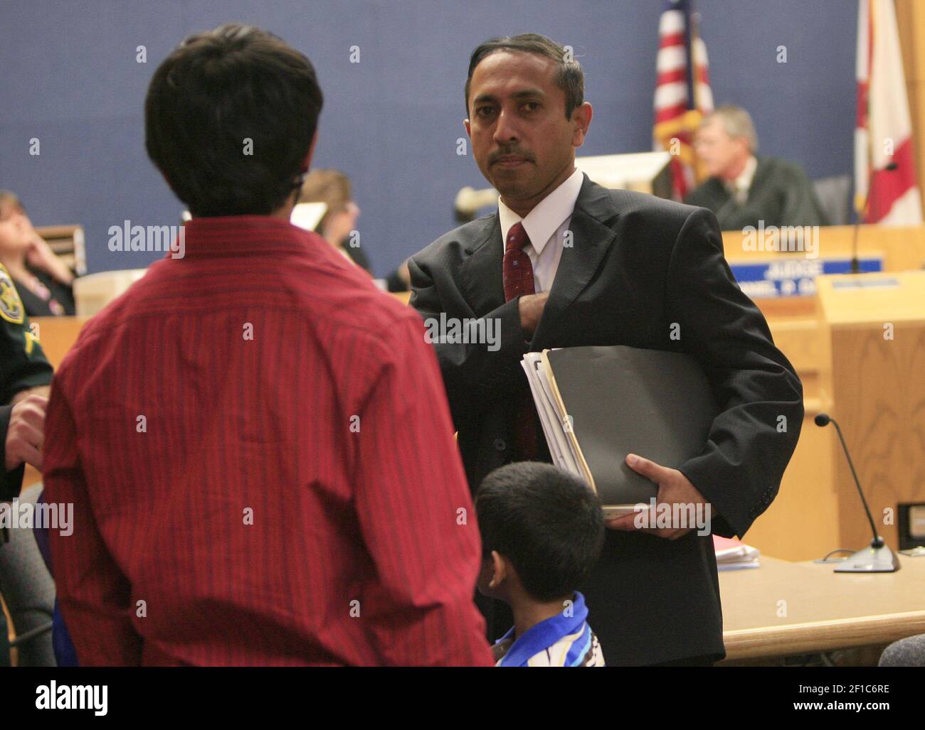 Mohamed Bary, father of Fathima Rifqa Bary, 17, waits in a courtroom at ...