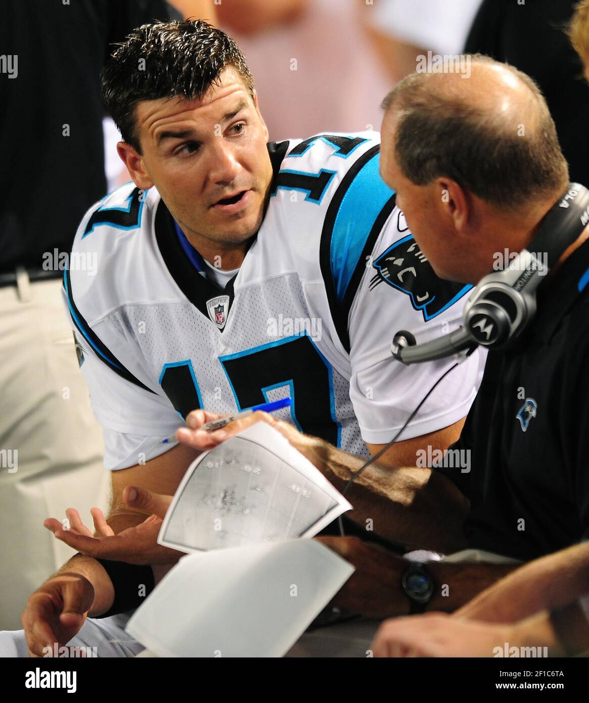 Carolina Panthers quarterback Jake Delhomme (17) talks to quarterbacks ...