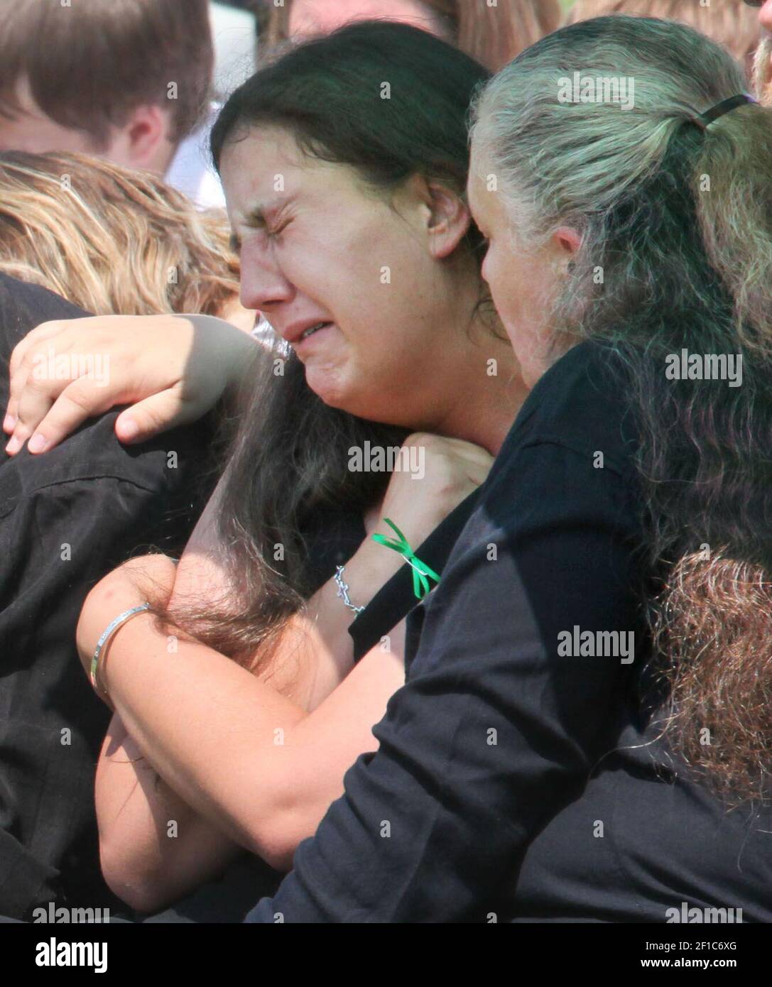 Melissa Jenkins, mother of 8-year-old Robert Manwill, weeps during his ...