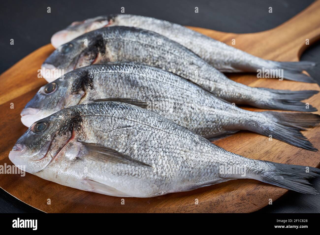 Closeup of fresh cooled whole raw bream ready to cook Stock Photo - Alamy