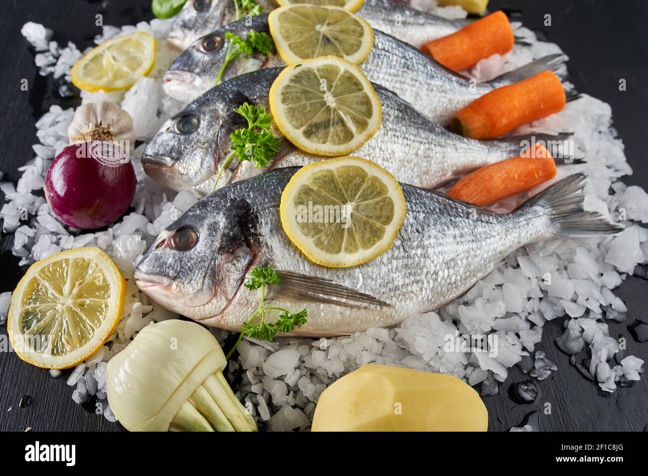 Closeup of fresh cooled whole raw bream ready to cook Stock Photo - Alamy