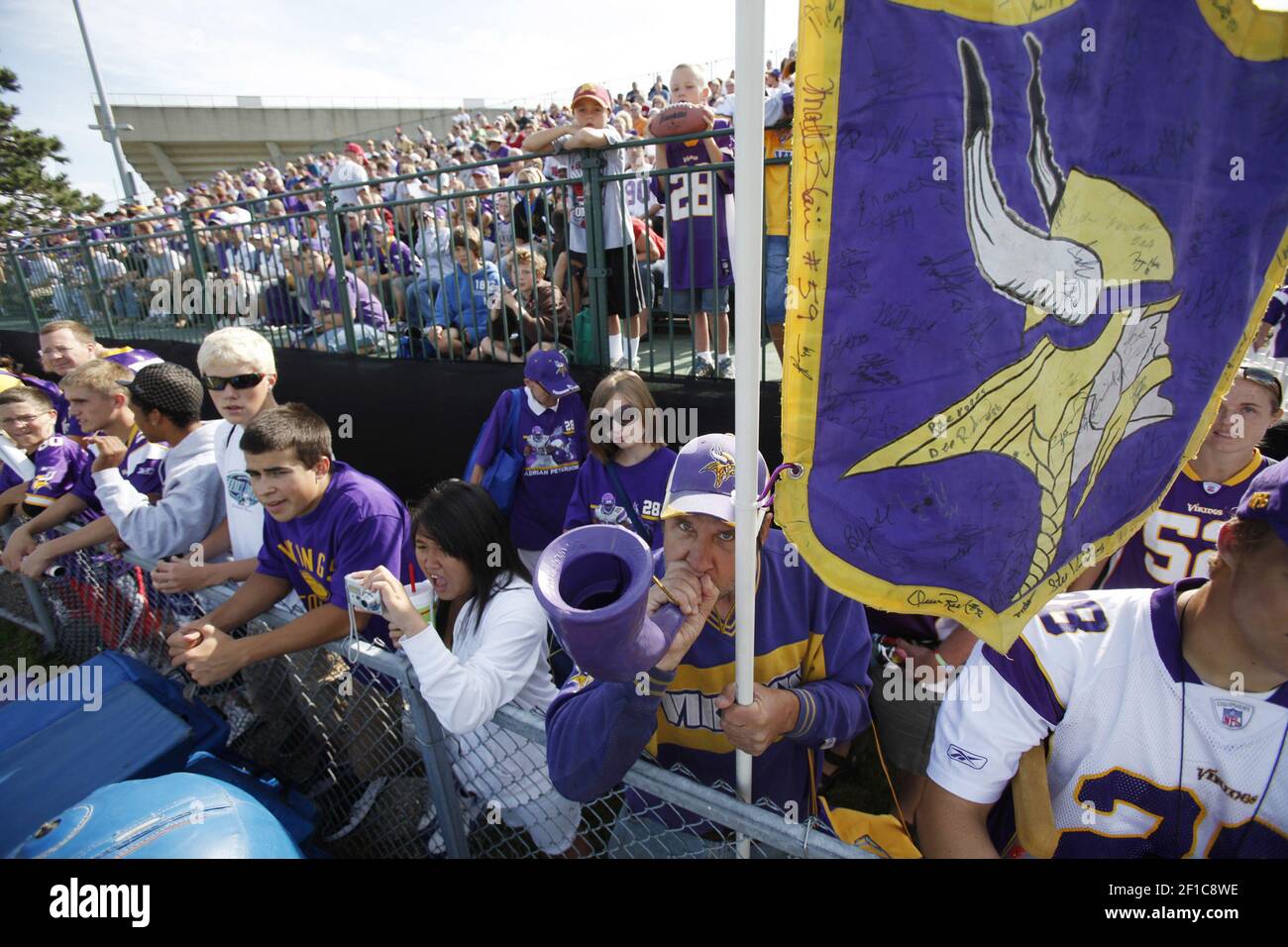 Rick Childs toots his horn during the first day of Vikings training ...
