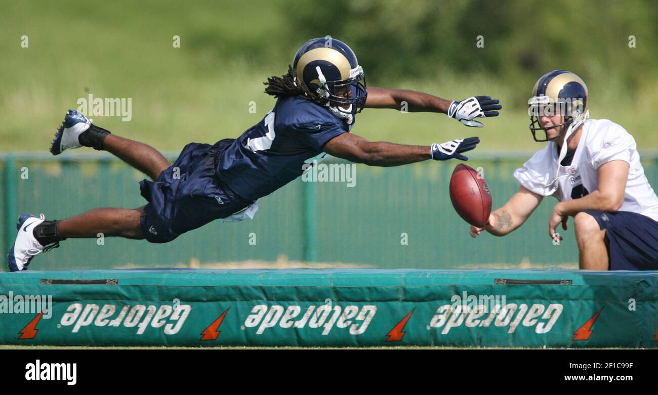 St. Louis Rams cornerback Cord Parks dives onto a padded pat as he ...