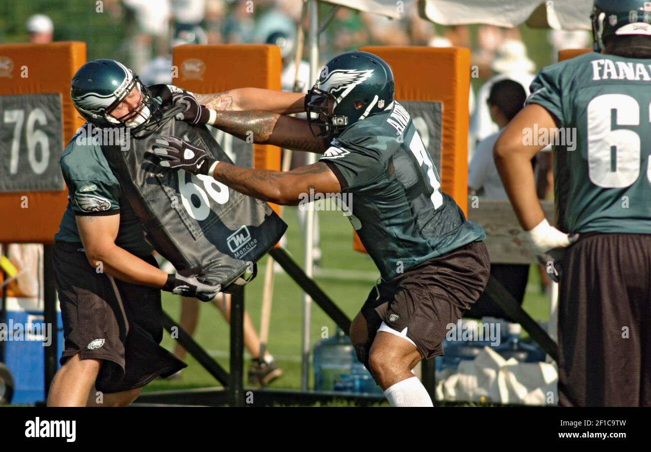 Philadelphia Eagles' Stacy Andrews, right, and Mike Gibson go at it ...