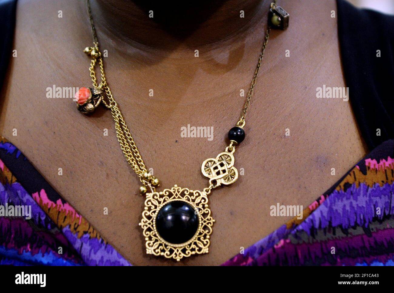 Candice Smith made a necklace from borrowed pieces from a different old ...