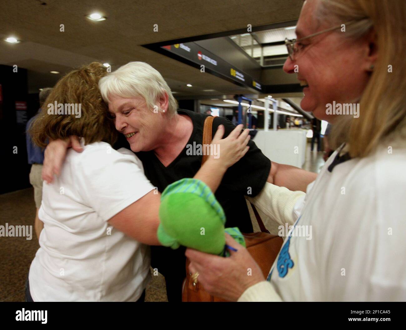 Renate Beedon, left, of Renton, hugs Karen Ketchum, of Indiana, as the ...