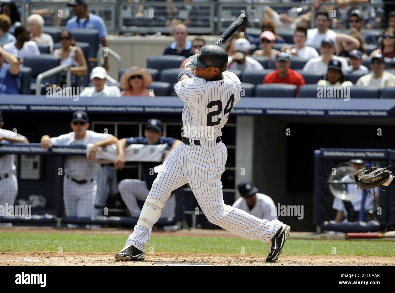 The New York Yankees' Robinson Cano hits a bases loaded double in the ...