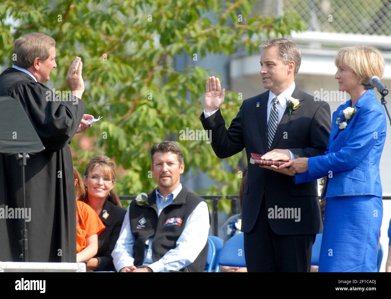 Alaska Gov. Sean Parnell, second from right, takes the oath of office ...