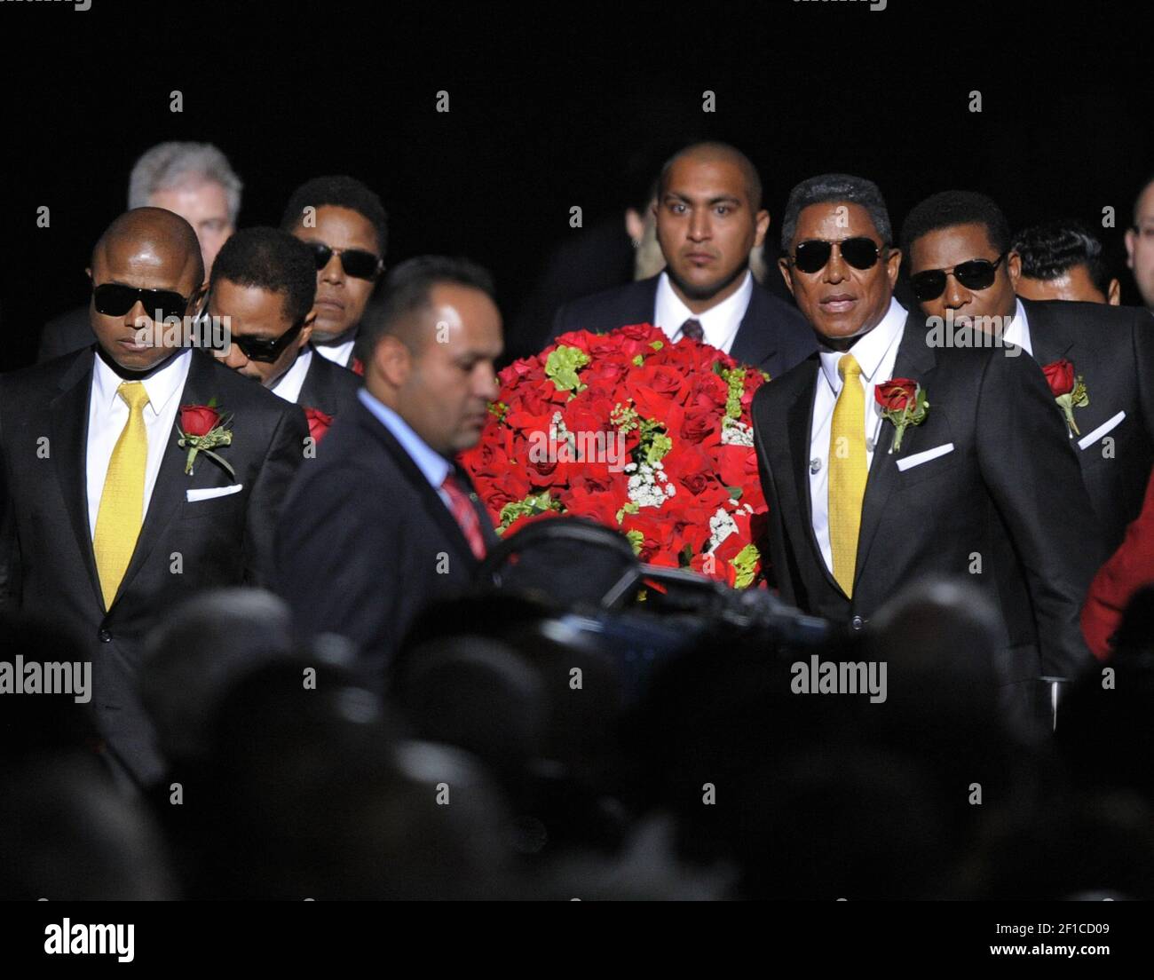 The Jackson Brothers accompany the casket into the memorial service for ...