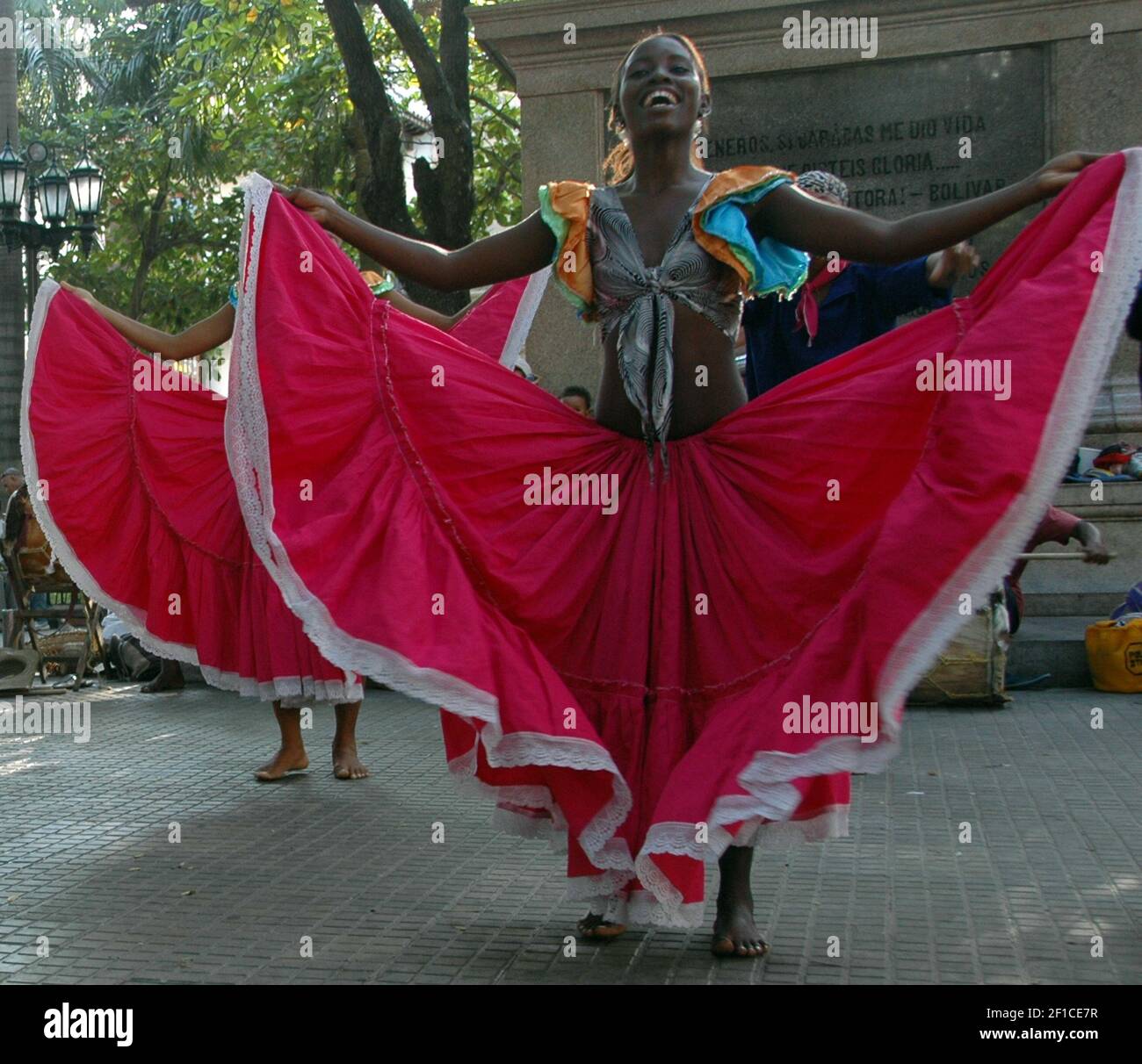 Cumbia dancers perform for donations in the Old City's plaza in ...