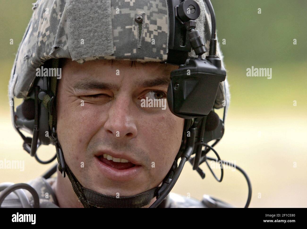 Sgt. Matthew Atchley looks at the map of the battle space during a ...