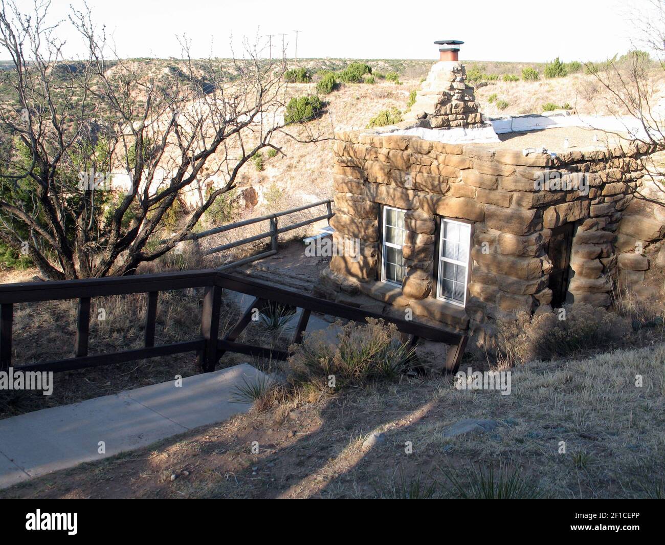 Stairs lead down to the Goodnight cabin on the rim of Timbercreek ...