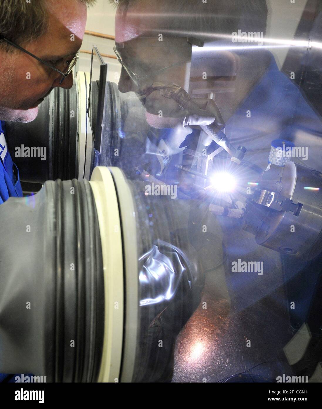 Bill Engstrom welds part of an ultra high vacuum system used in the ...