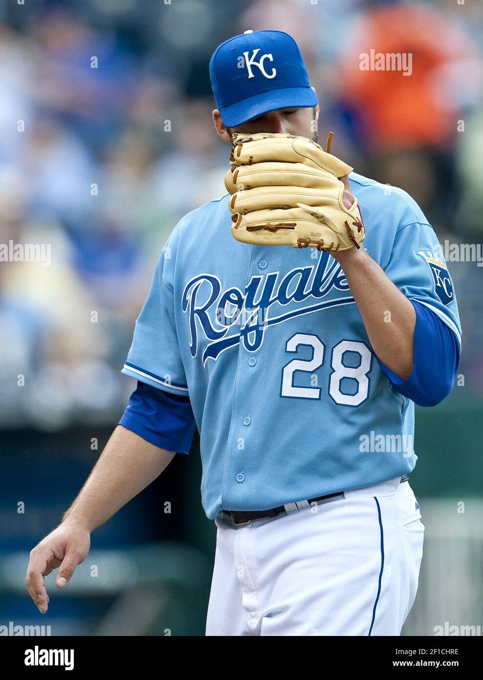Kansas City Royals starting pitcher Kyle Davies (28) walks off the ...