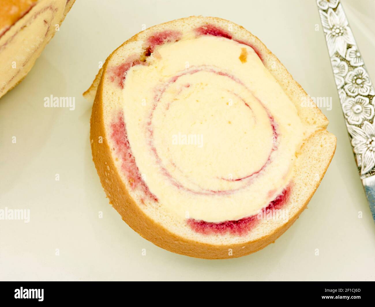 Arctic roll food still-life against plain background, delightful retro ...