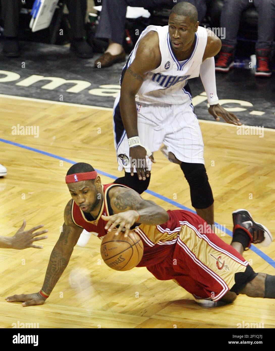 Cleveland Cavaliers forward LeBron James falls to the floor while ...