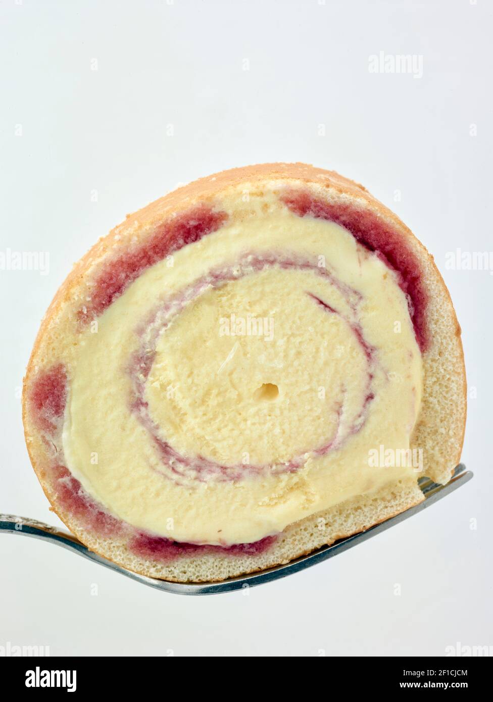 Arctic roll food still-life against plain background, delightful retro ...