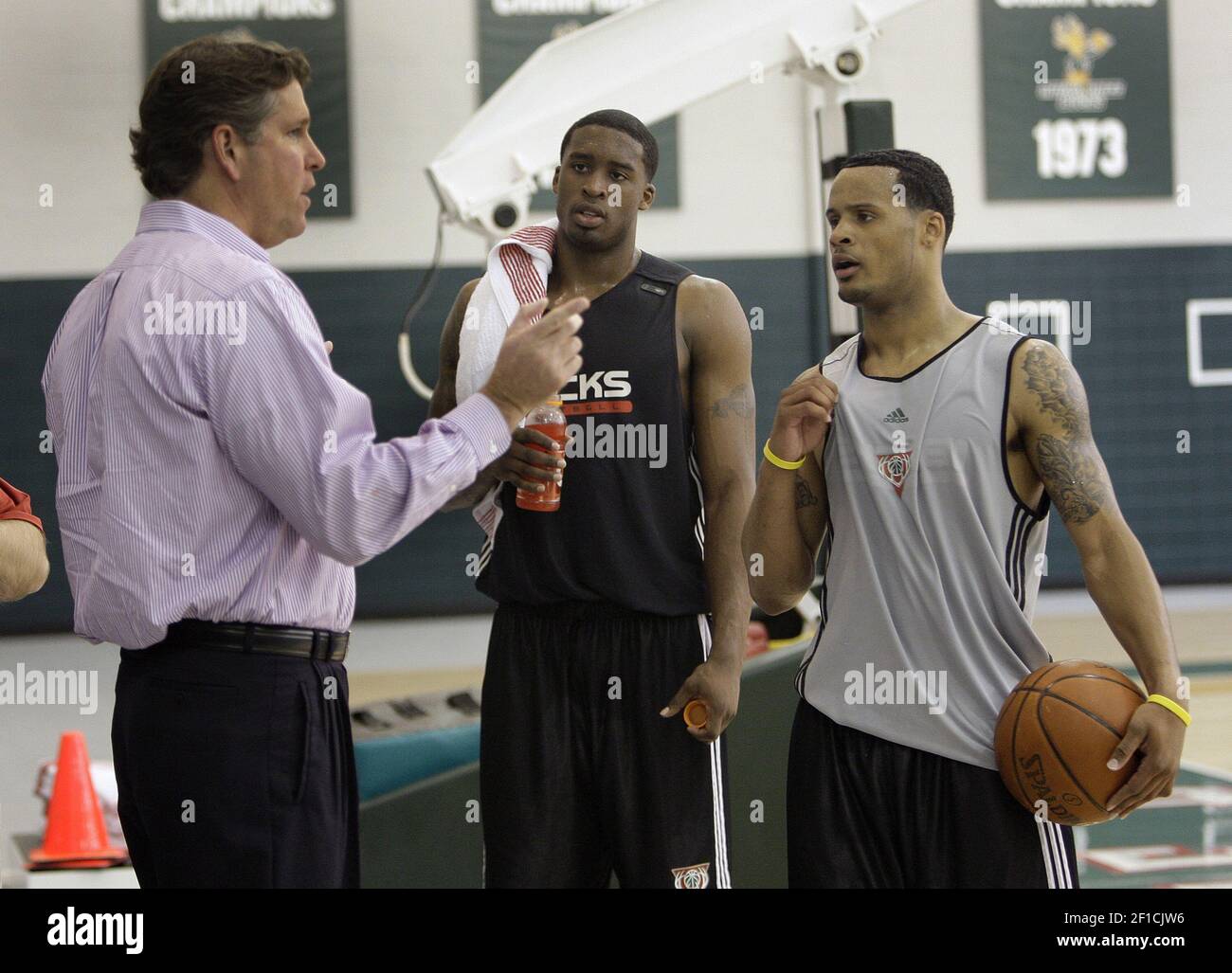 Milwaukee Bucks director of player personnel Dave Babcock talks with ...
