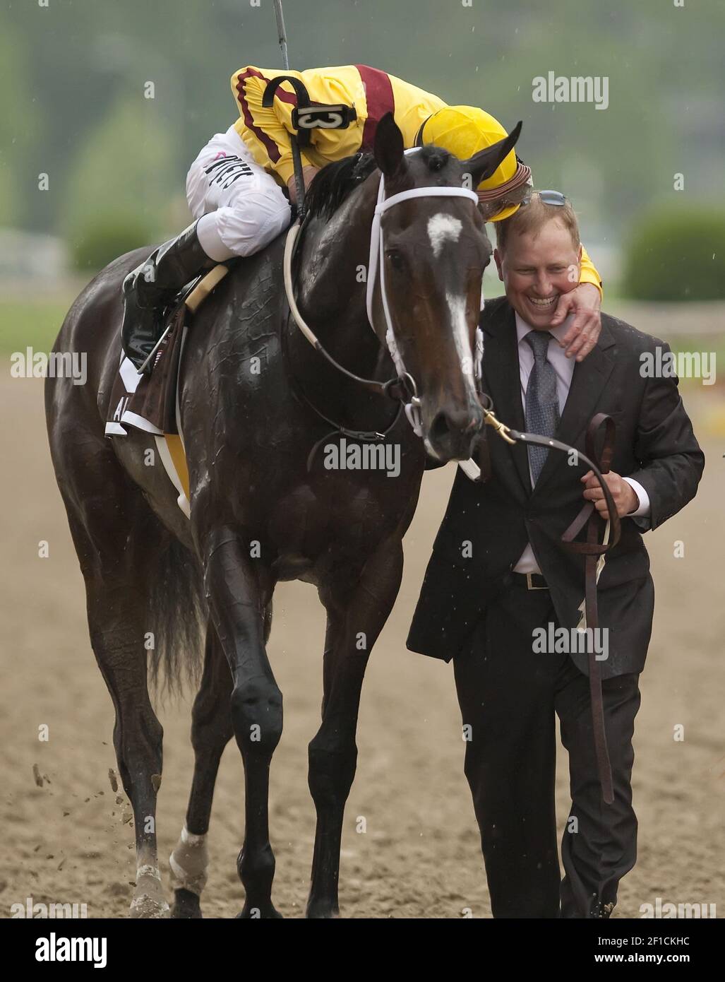 Jockey Calvin Borel celebrates aboard Rachel Alexandra with assistant ...