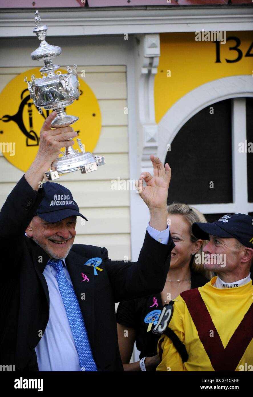 Rachel Alexandra owner Jess Jackson raises the Preakness Stakes trophy ...