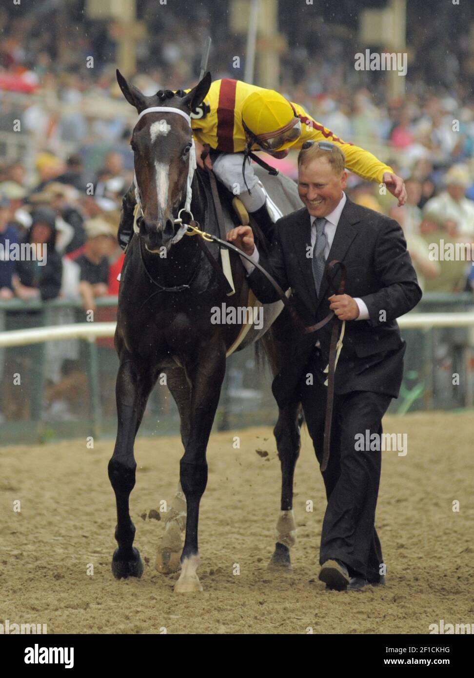 Jockey Calvin Borel celebrates aboard Rachel Alexandra with assistant ...
