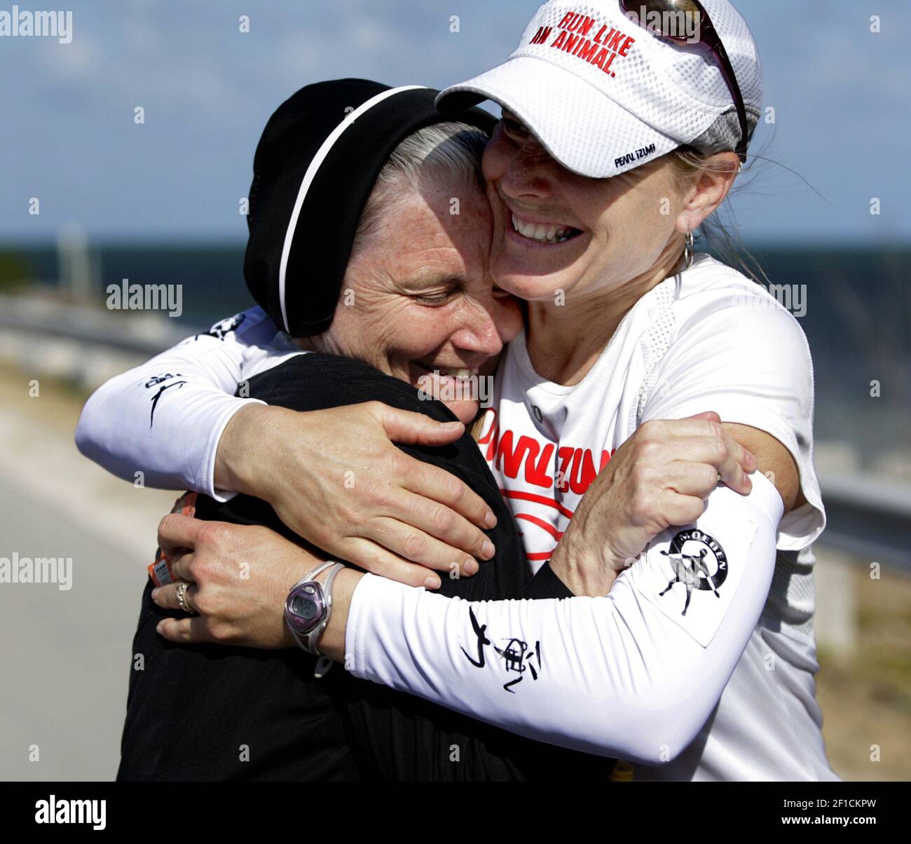 Sister Mary Elizabeth Lloyd gets a hug from her trainer Lisa Smith ...
