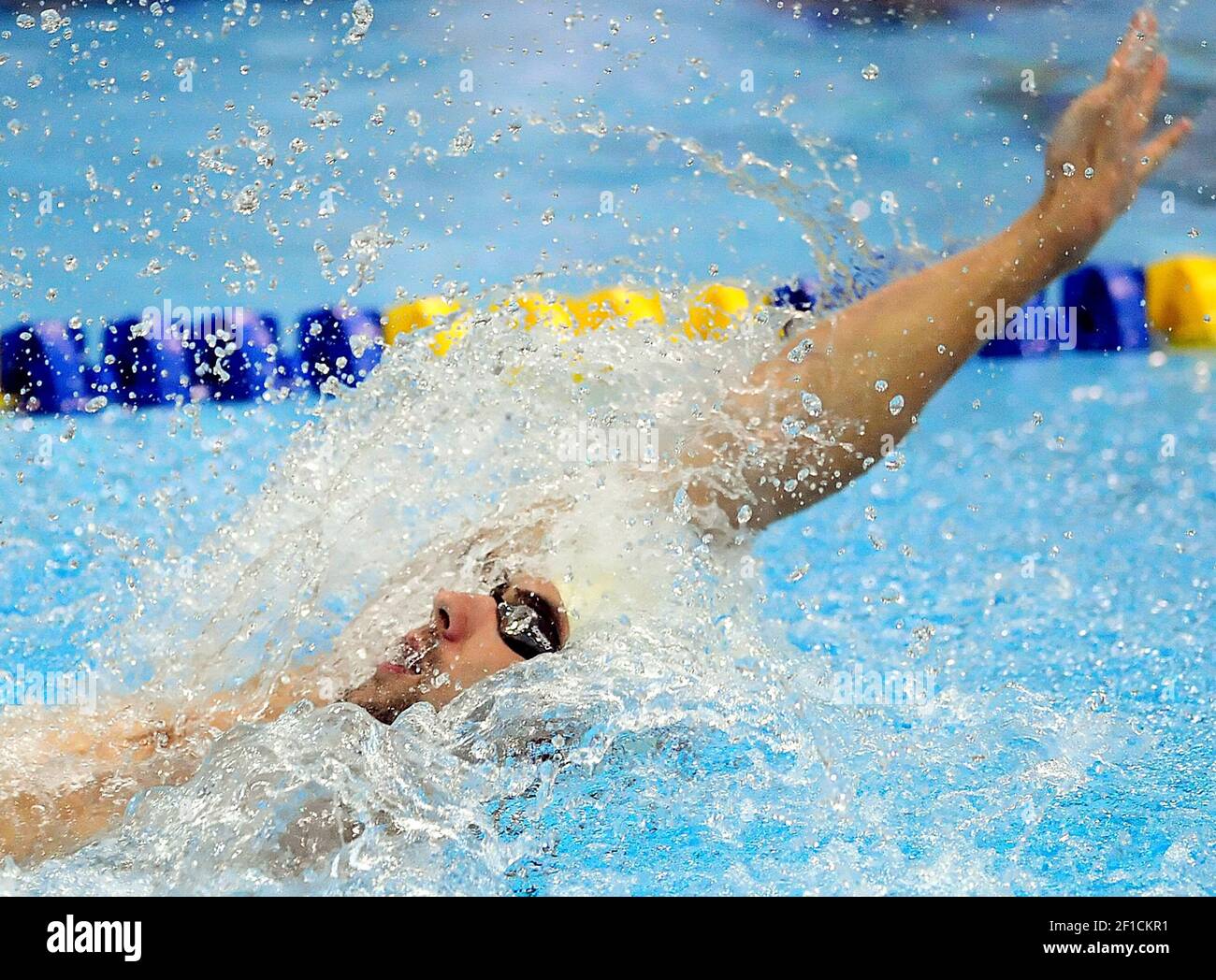 Olympic swimmer Michael Phelps competes in the men's 100-meter ...