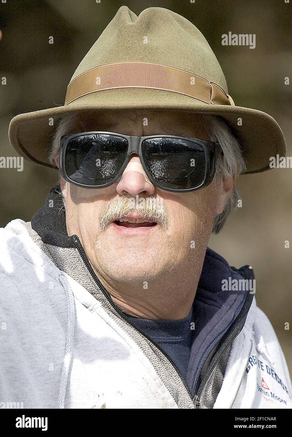 Rick Moss, of Wausau, Wisconsin, prepares to fly fish with friend Tom ...