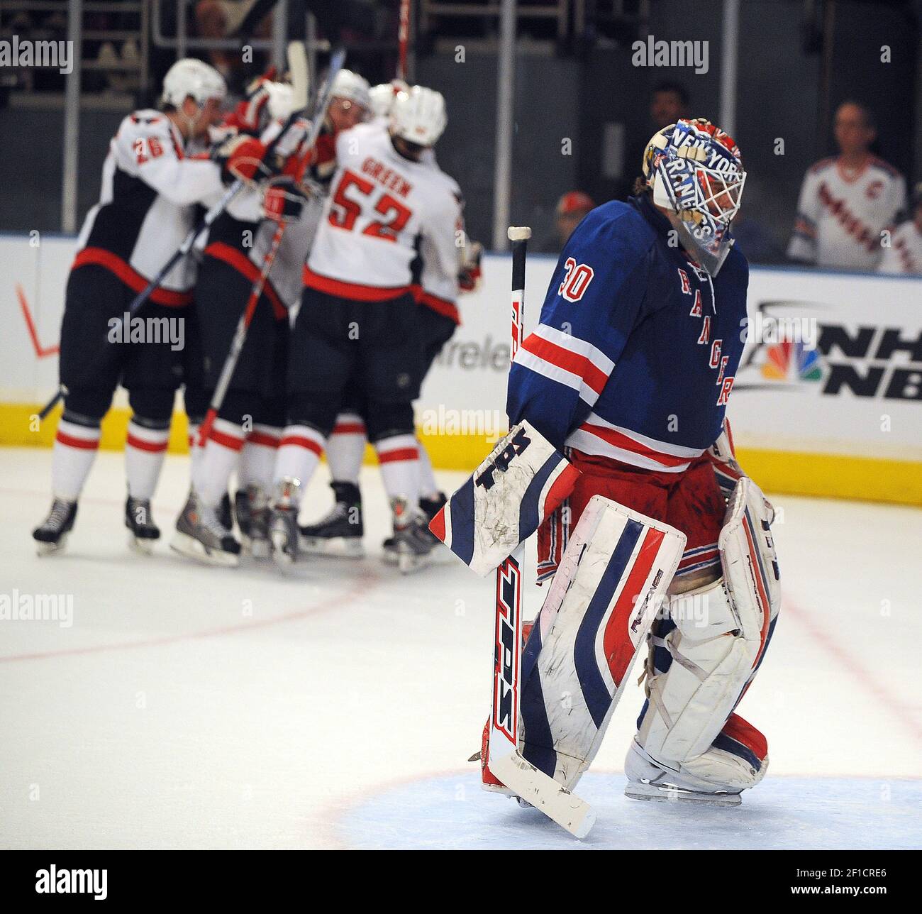 New York Rangers goalie Henrik Lundqvist (30) lowers his head after ...