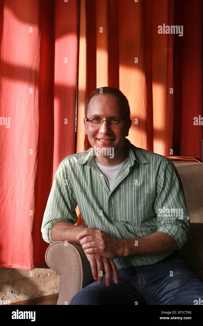 Steve Mnich sits in his loft in St. Louis, Missouri, March 31, 2009 ...