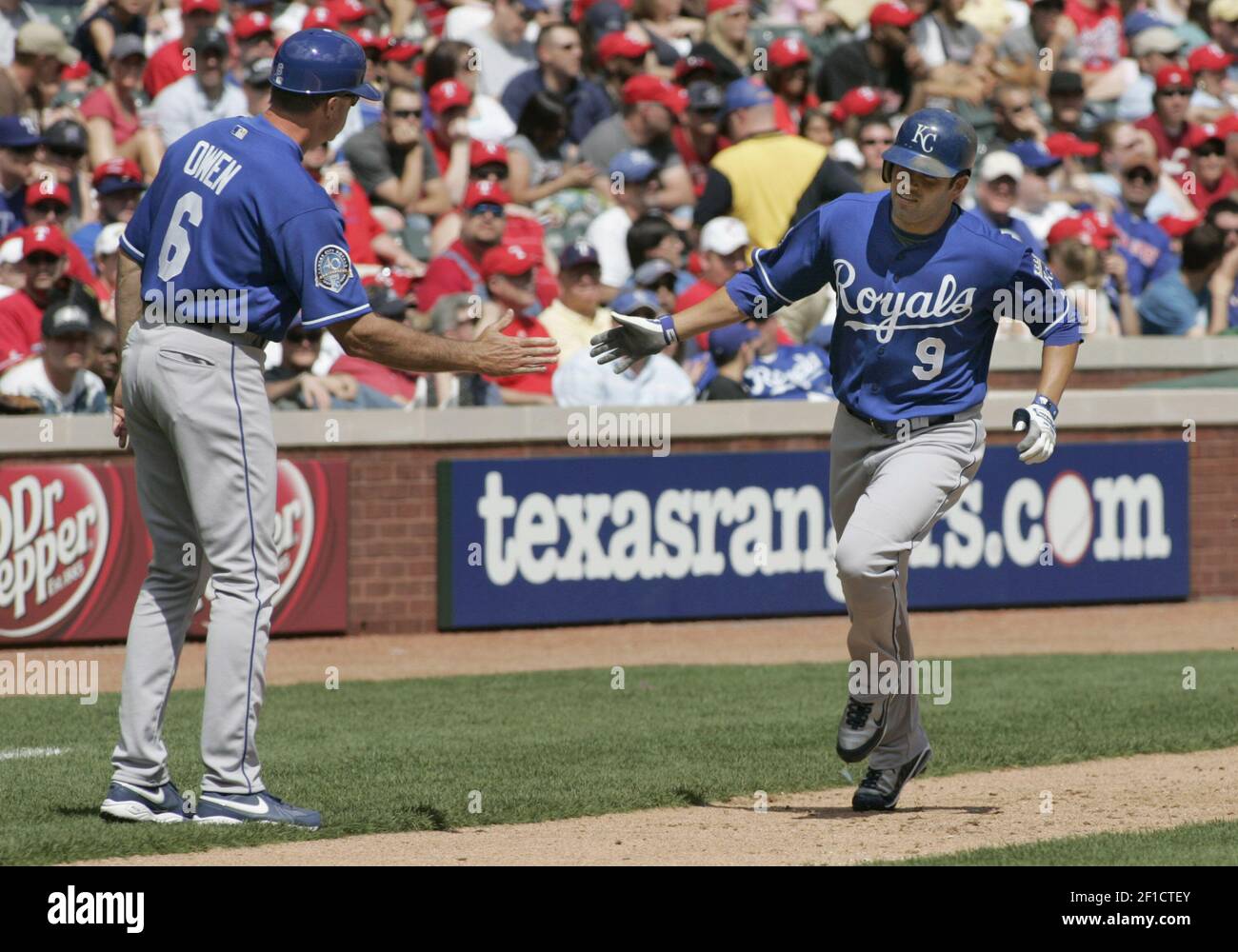 Kansas City Royals left fielder David DeJesus is congratulated by third ...
