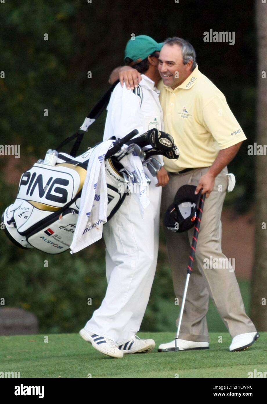 Angel Cabrera, right, hugs his caddie Ruben Yorio after sinking the ...