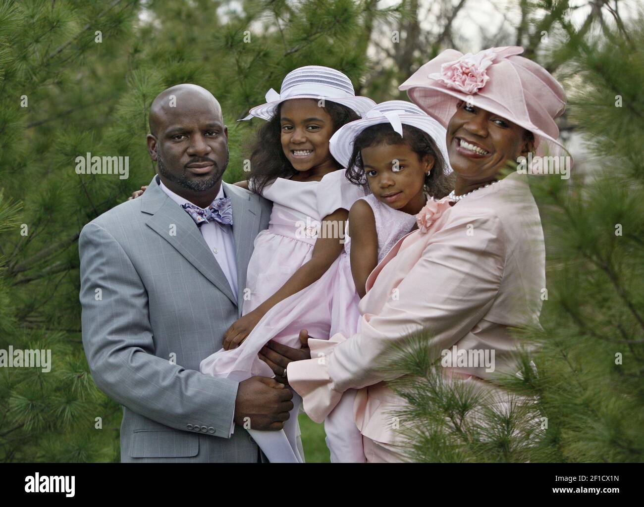Rev. Mark and Leslie Tyler with daughters Madison, 5, left, and Sharon ...