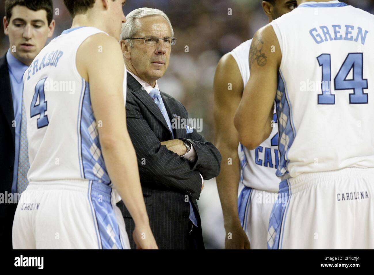 North Carolina head coach Roy Williams talks to his team during second ...