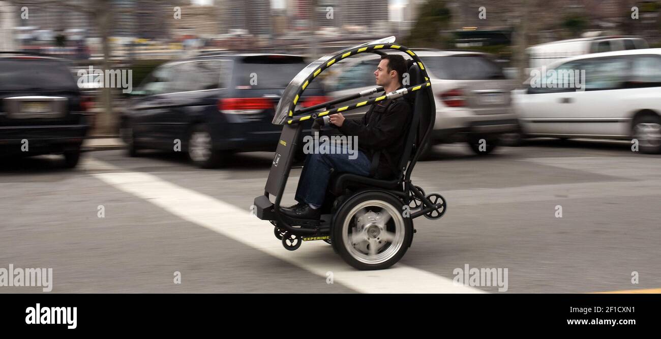 General Motors and Segway are developing an electric two-seat prototype ...
