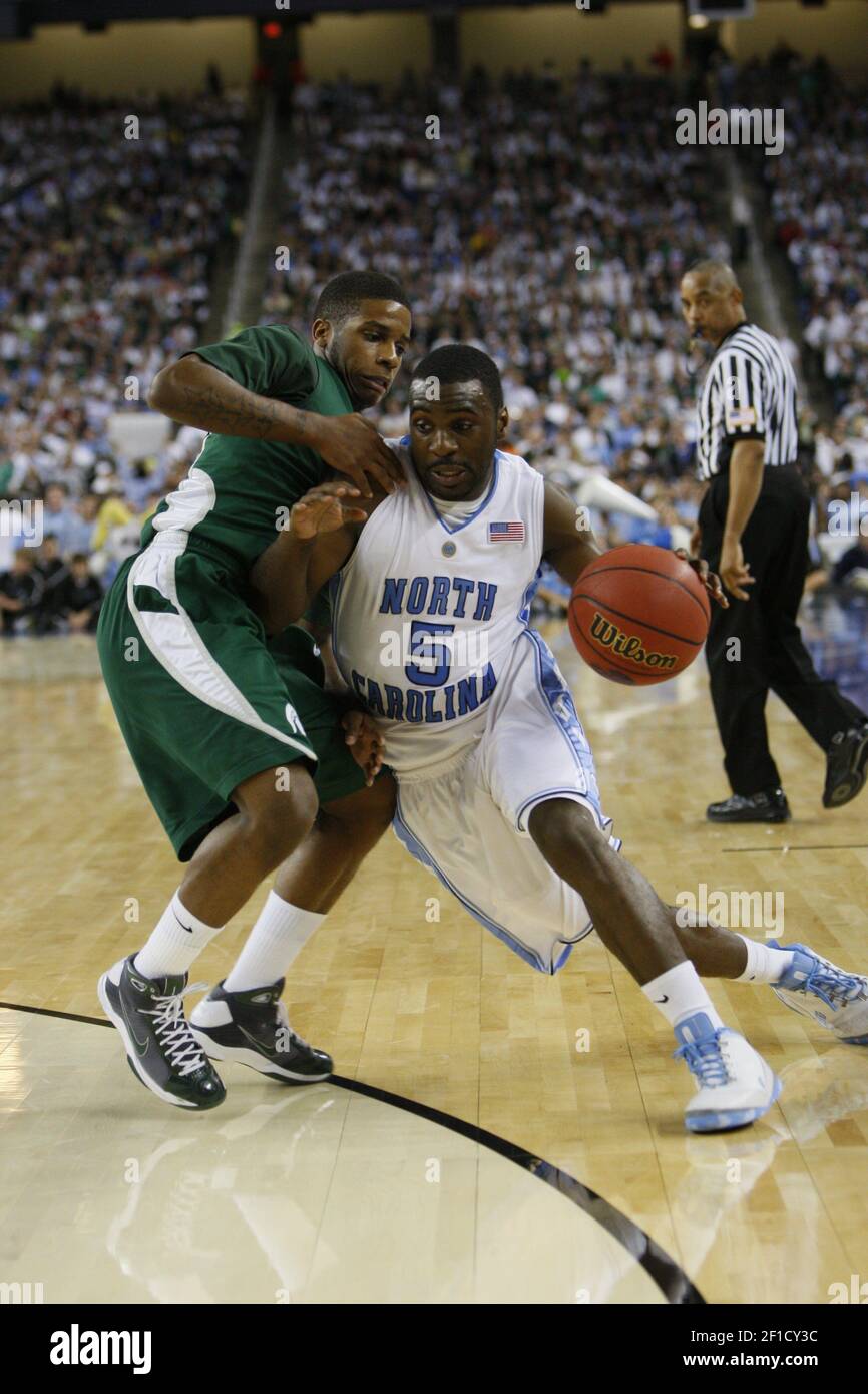 North Carolina's Ty Lawson drives against Michigan State's Korie ...