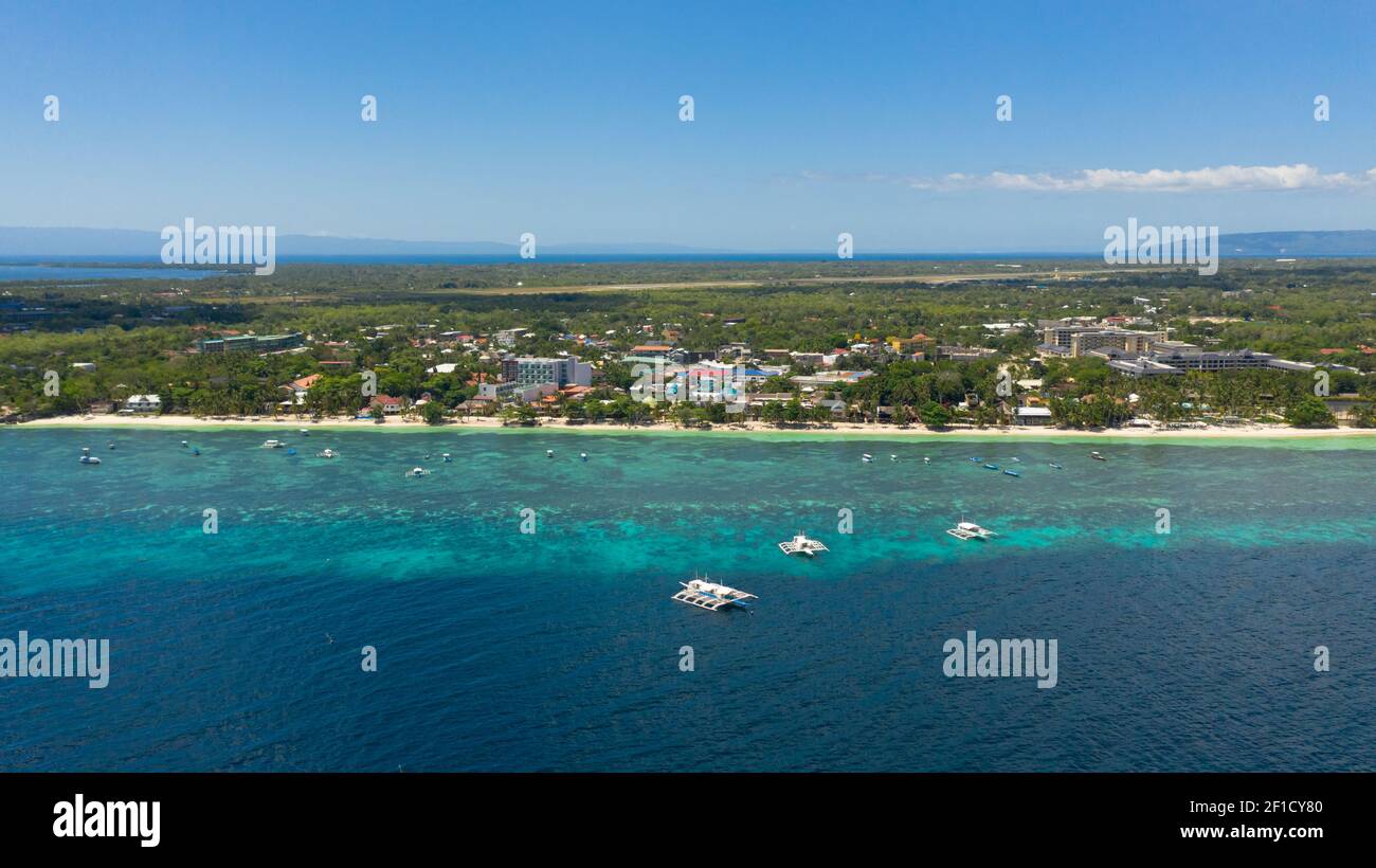 Beautiful tropical beach with white sand, palm trees, turquoise ocean ...