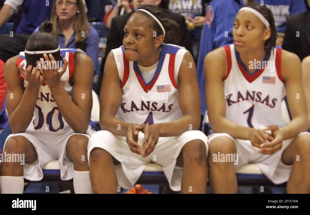 From left, Kansas guard LaChelda Jacobs (00), guard/forward Danielle ...
