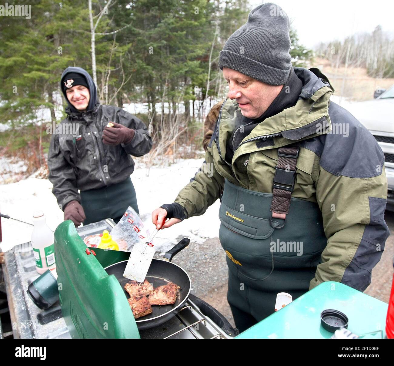 Charlie Sundberg fries Italian sausage venison with his nephew Nate ...