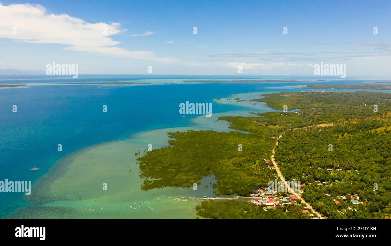 Aerial seascape: Tropical Islands and blue sea against the sky with ...