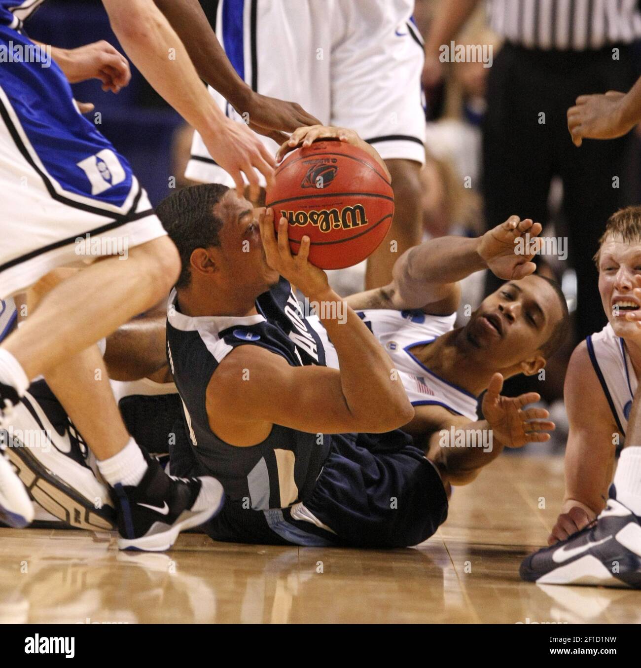 Villanova's Corey Fisher scrambles with Duke's Lance Thomas in the ...