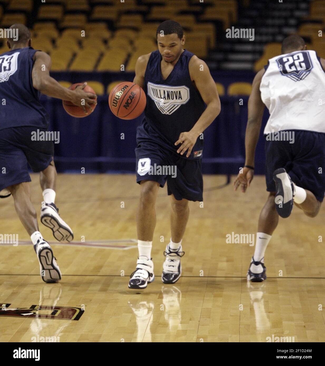Villanova's Corey Fisher dribbles the basketball during practice ...