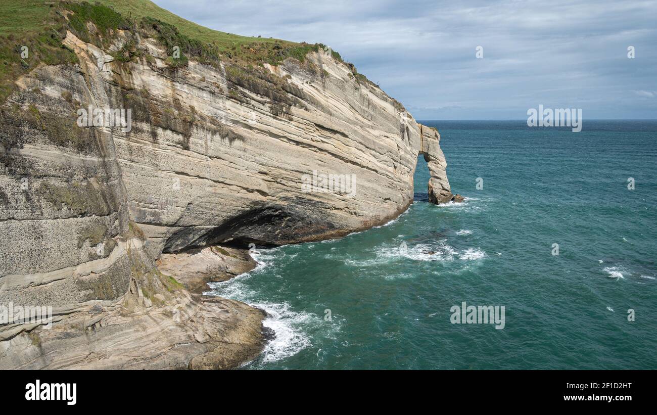 Big cliff leading into the ocean, shot at Cape Farewell, New Zealand ...